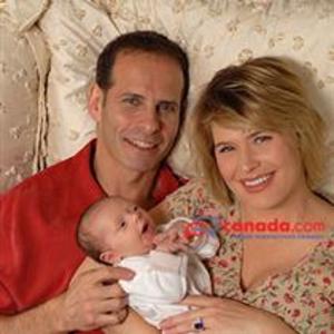 Skating with Celebrities couple Lloyd Eisler and Kristy Swanson show off their new son, Magnus Hart